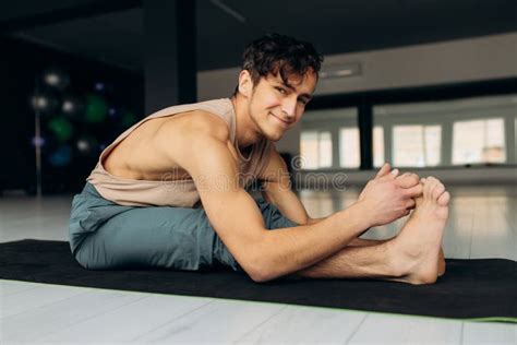 Happy Athletic Young Man Stretching His Body Guy Enjoying Yoga