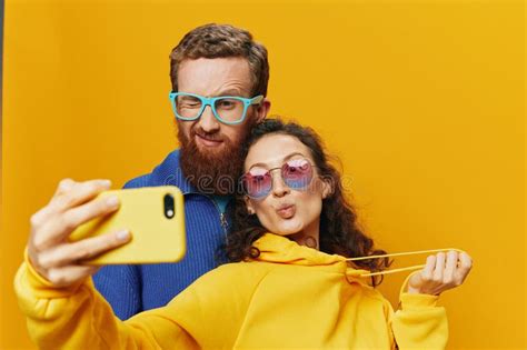 Woman And Man Funny Couple With Phones Hand Social Networking And