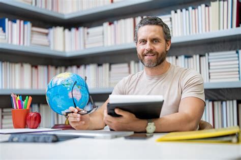 Teacher In Classroom Knowledge And Education With Handsome Teacher Teacher With Book In