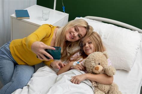 Joyful Moments A Beautiful Mother And Daughter Hospital Selfie Filled