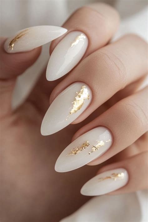 Classy Milky White Nails With Gold Foil Elegant Nail Design