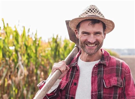 Premium Photo Portrait Of Happy Farmer On Field