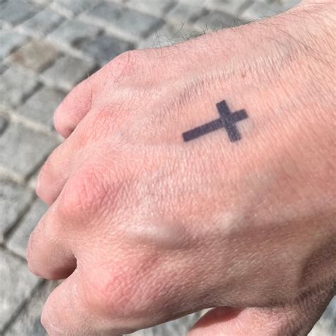 Small Cross Tattoo On Hand