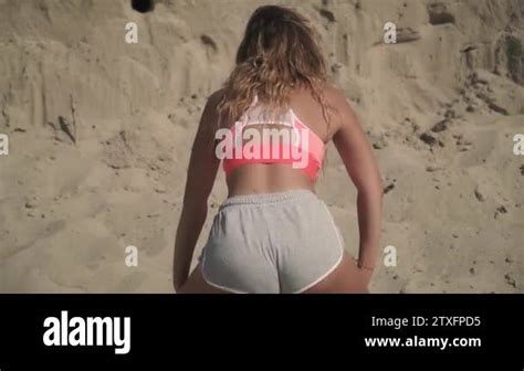 Female With Beautiful Body Dancing Twerk On The Sand Girl Moves Her