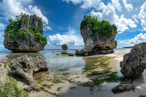 Stunning Panoramic View Of Tropical Island Beach With Unique Rock