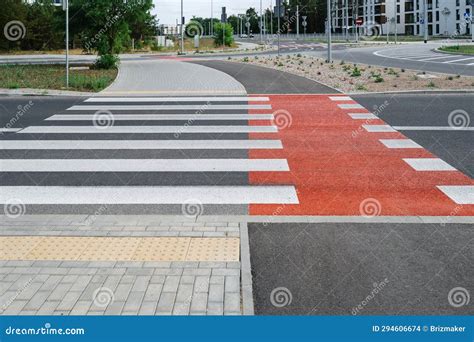 Pedestrian Crossing With White Stripes On Asphalt And Marking For
