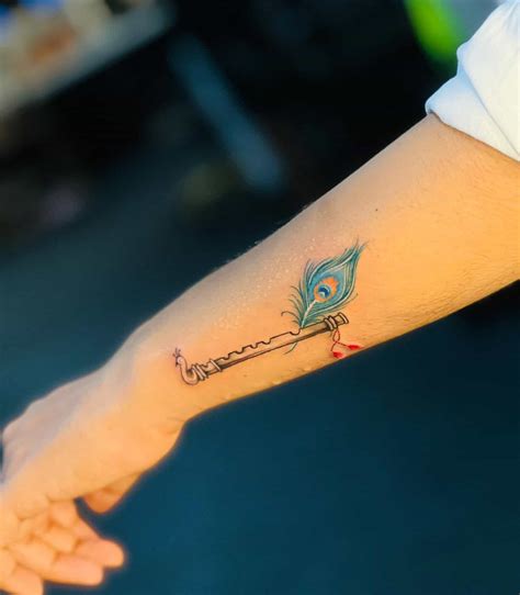 14 Beautiful Peacock Feather Tattoo Ideas For Women In 2024