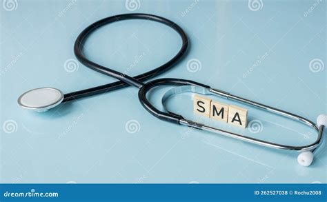 Sma Spinal Muscular Atrophy Written On Wooden Blocks A Rare Disease