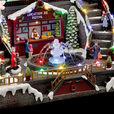 Village De Noël Fontaine Et Patinoire Animé 55 Led Transfo Feeric