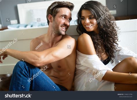 Beautiful Passionate Couple Having Sex Bedroom ภาพสต็อก 1240212799
