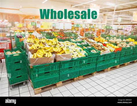 Assortment Of Fruits At Supermarket Word Wholesale On Background Stock