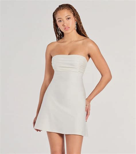 White Pleated Dresses And Windsor