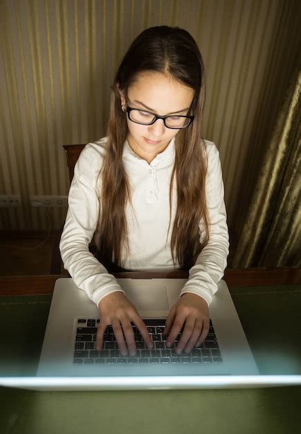 Premium Photo Portrait Of Computer Geek Girl Sitting At Laptop At Night