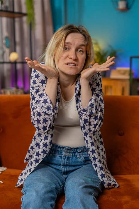 Confused Caucasian Woman Feeling Embarrassed About Ambiguous Question