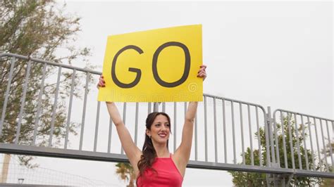 Cheerleader Girl Cheers Her Heart Team With Go Yellow Signboard Stock Video Video Of Signboard