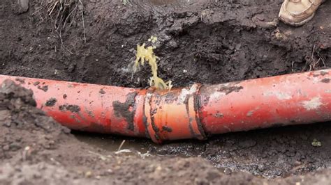 Dramatic Burst Sewer Pipe Water And Sewage Gushing And Pouring On The Ground Stock Footage