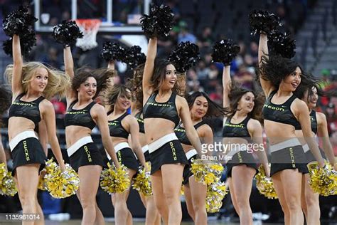 Oregon Ducks Cheerleaders Perform During A Quarterfinal Game Of The