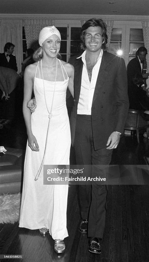 American Actor George Hamilton And His Fiancee Alana Collins Attend A