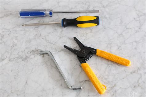 DIY Tutorial: How to Replace a Garbage Disposal | The DIY Playbook