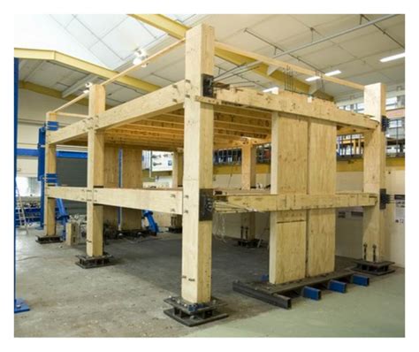 Experimental Posttensioned Timber Building In The Laboratory Of The