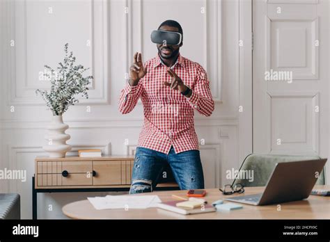 Young Programmer Or Software Developer African American Man In Vr Headset Glasses Testing 3d