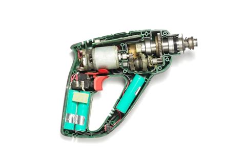 Premium Photo Battery Powered Screw Gun Drill Screw Gun Repair Drill Is Disassembled Into Two