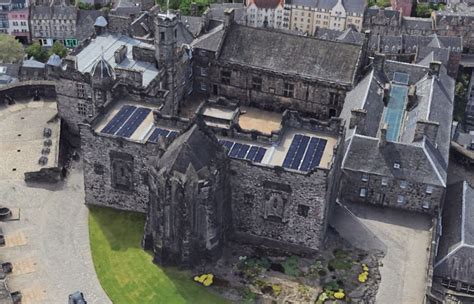 Row Over Eco Friendly Solar Panels And Heating Systems On Uks Historic