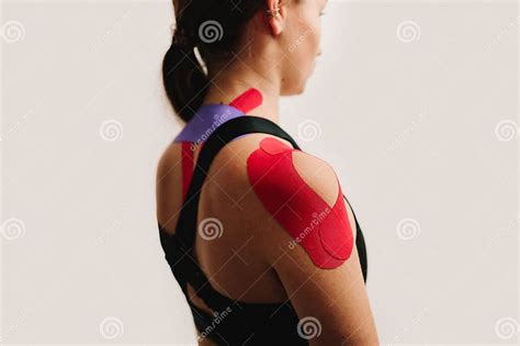 Shoulder Kinesiology Taping Creates Muscle Contraction To Body Of