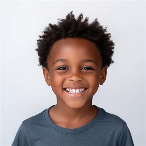 Premium Photo A Young Boy With A Smile On His Face Generative Ai