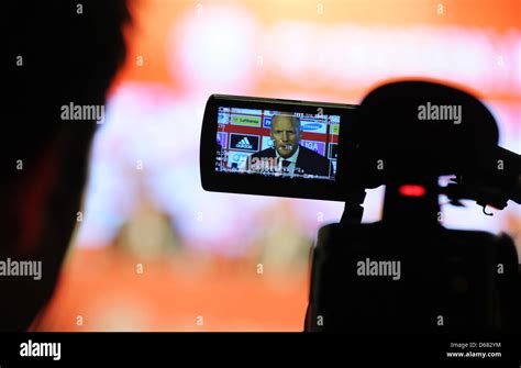Fc Bayern Munichs New Sports Director Matthias Sammer Is Pictured Through The Screen Of A