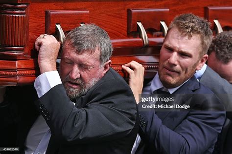 The Father Of Phillip Hughes Gregory Hughes Carries The Coffin With