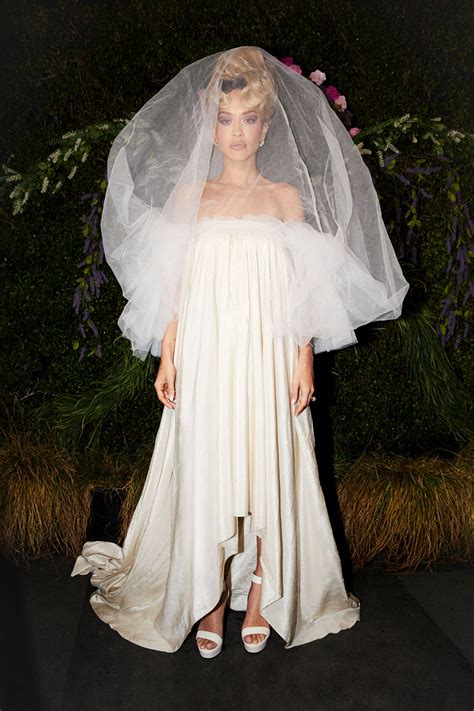 Newlywed Rita Ora Wears A Vintage Yves Saint Laurent Wedding Dress In Her New Music Video