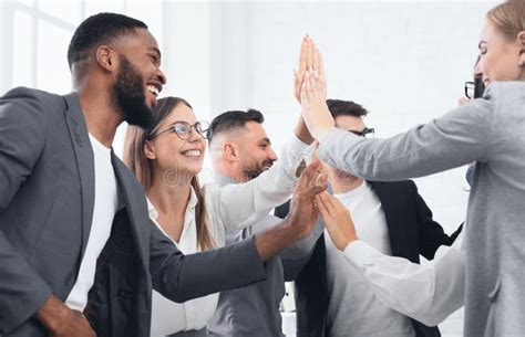 Team Achievement Diverse Business People Giving High Five Stock Image
