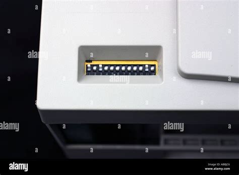 Set Of Electronic Dip Switches On An Inkjet Printer Used To Select Printer Functions By Manual