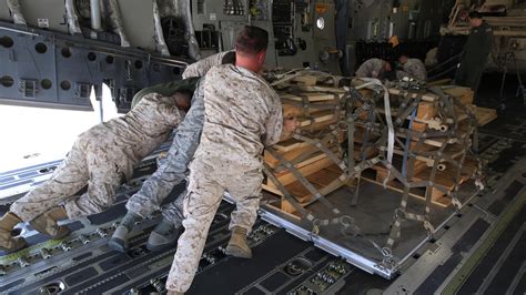 Marines Airmen Transport Tank Using Strategic Airlift United States