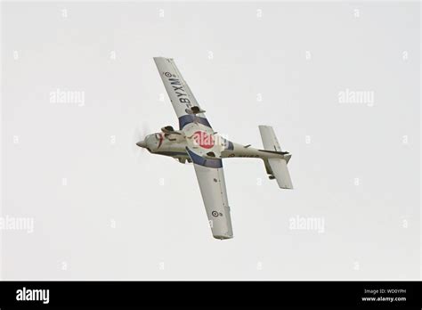 An R A F Tutor Grob 115e Rolls Over Onto Its Back As Part Of Its Display At Eastbournes