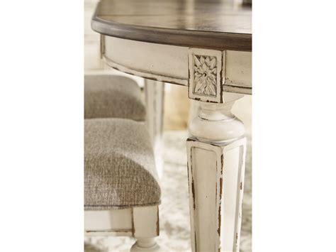 Realyn Dining Table And 6 Chairs Ashley Furniture Homestore