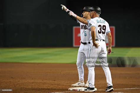 Alek Thomas Of The Arizona Diamondbacks Reacts On First After Hitting