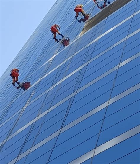 Building Facade Cleaning By Rope Grace Facilities