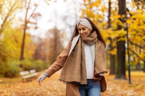 Portrait Of Smiling Young Woman In A Park In Autumn Stock Image Image