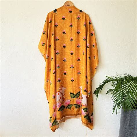Suvidha Muslin Kalamkari Digital Print Mustard With Pichwai Cow And L