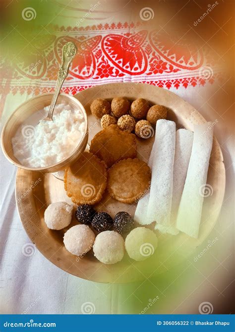 Assamese Traditional Food Items Like Pitha Laddu Doi Sira With Assamese Gamosa Background