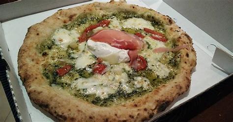 Mozzarella Basil Pesto Vesuvian Tomato Slices And In The Middle Buffalo Milk Ricotta And