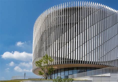 Circular Metal Building With Unique Facade Design