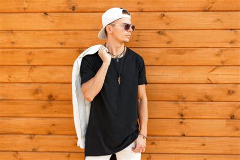 Handsome Fashionable Man With Sunglasses In A White Baseball Cap With A