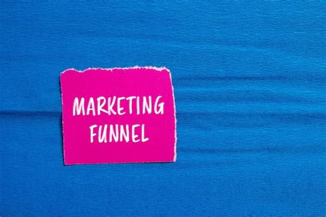 Premium Photo Marketing Funnel Message Written On Ripped Torn Pink