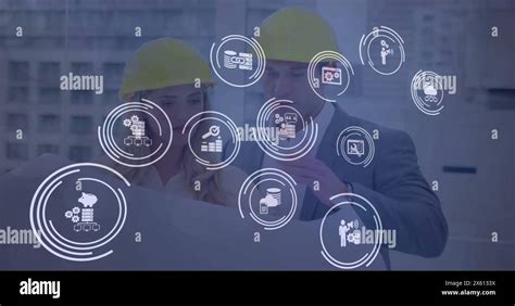 Image Of Icon In Loading Circles Over Caucasian Engineers Discussing