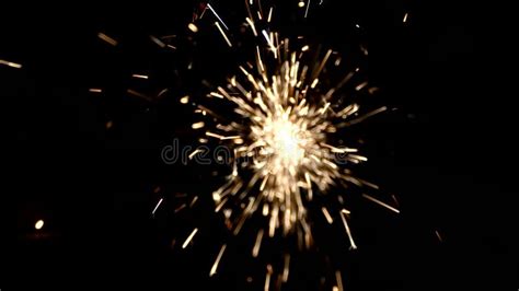 Bright Sparks On A Black Background Sparks Of Fire Fly And Fall Cut