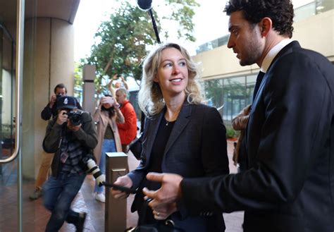 Why Is Elizabeth Holmes In Prison Fraud Case And Charges Revisited As