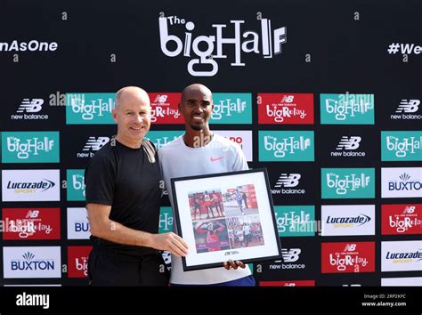 Sir Mo Farah Presented With A Framed Photograph Of His Career Achievements By Event Director
